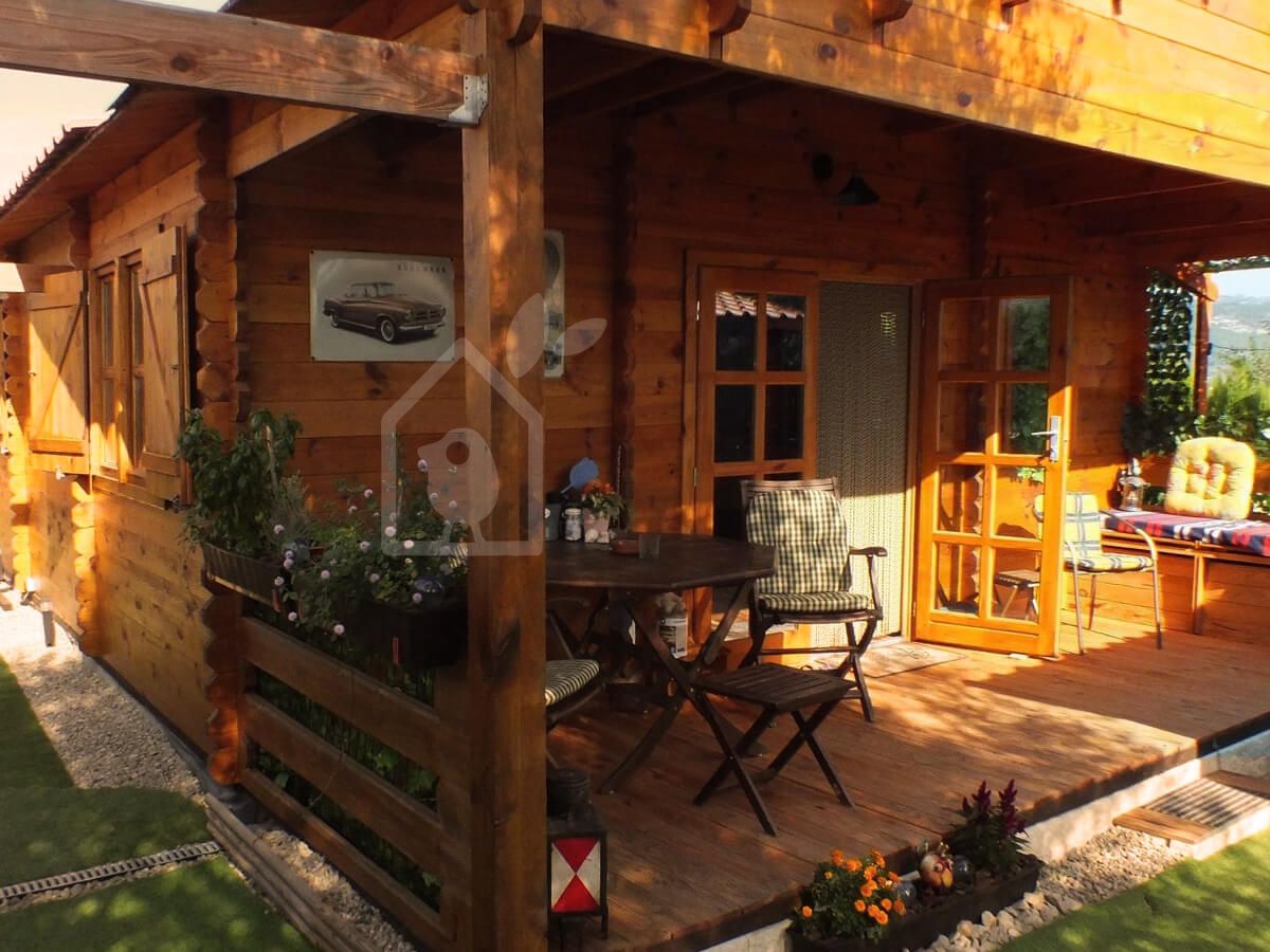 Casa in legno con porticato DONNA (44+44 mm), 63 m² + 11.5 m²
